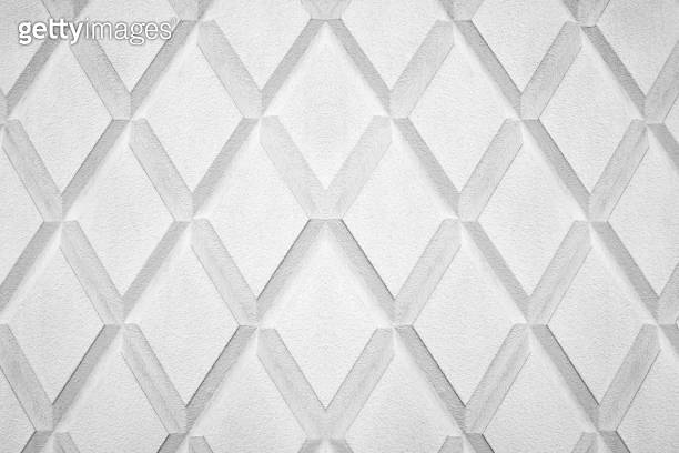 Abstract rhombus shape white and black color background close up, gray ...
