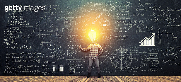 Student with lit light bulb as a head solving math problem drawn on ...