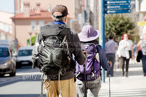 Rear view of two pilgrims in the 'camino de Santiago'. (1138834699 ...