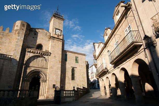 Old town arcade, cathedral doorway, clock tower in Ourense, Galicia ...