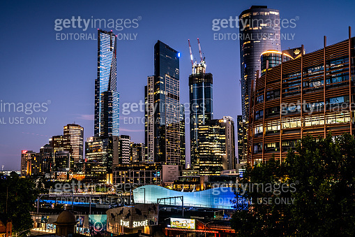 Melbourne skyline at dusk with riverside quay buildings including the ...