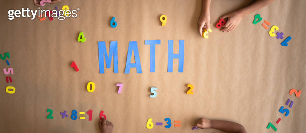 Aerial View of Multi-Ethnic Elementary Students Arranging Numbers on a ...