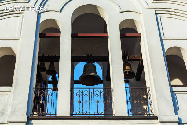 Big bell on the belfry of the bell tower of a Christian church temple ...