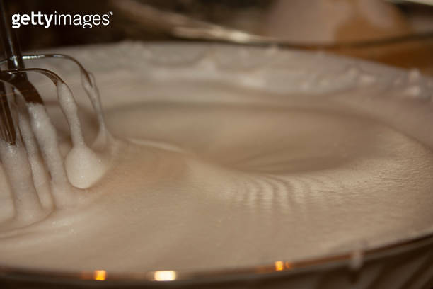 Foam texture of egg whites raised to nougat used for meringues and ...