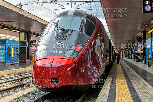 Red High-Speed Train - A front end view of a red modern high-speed ...