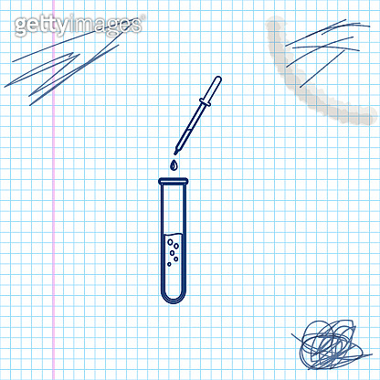 Laboratory pipette with liquid and falling droplet over glass test tube ...