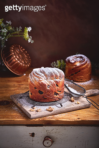Panetone kulich craffin in vintage dark rustic scene. Easter bread ...