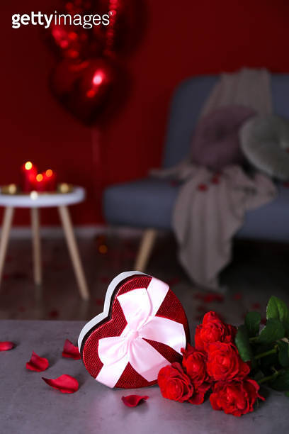 St. Valentines day composition with the bouquet of roses and other ...