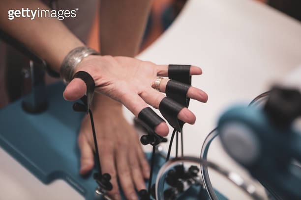 Details with the hand of a woman kinetotherapy medic (physical ...
