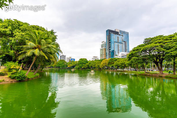 Bangkok cityscape view from Lumpini park in city center. Panoramic ...