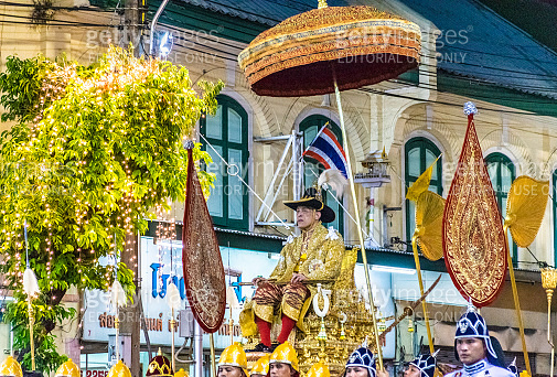 Thailand's King Maha Vajiralongkorn is carried in a golden palanquin ...