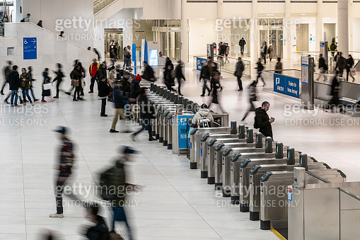 Unrecognizable passenger and tourist walking and Swipe the card for in ...