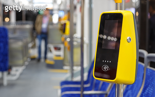 Bus with validator for self-payment. Fare control without a conductor ...