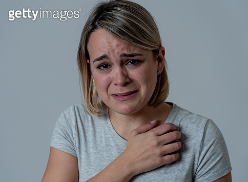 Portrait of young sad depressed woman crying, looking miserable and ...