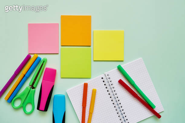 School subjects on green background. Back to school concept. Flat lay ...