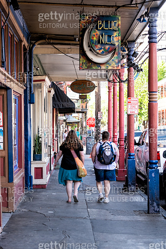 French quarter at Frenchmen street in New Orleans with sign for Blue ...