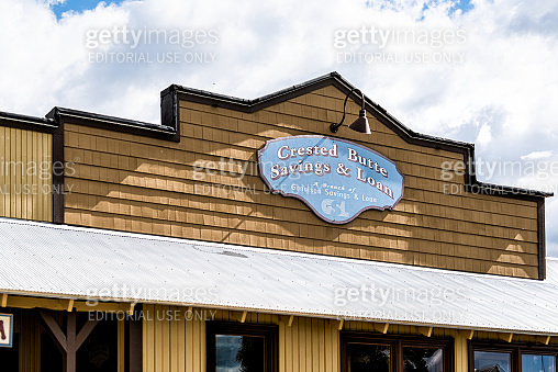 Crested Butte, Colorado village with sign for bank exterior Gunnison ...