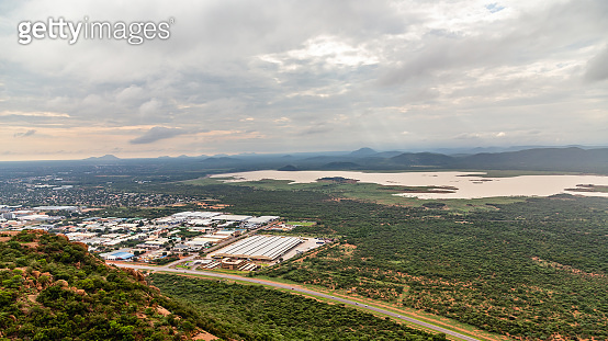 Aerial view of suburbs of Gaborone city spread out over the savannah ...