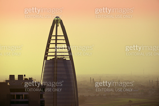 GNPOC Headquarters tower at dusk - Greater Nile Petroleum Operating ...
