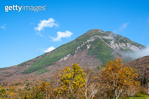 Mount Rausu with autumn leaves as seen from Shiretoko Pass Road ...