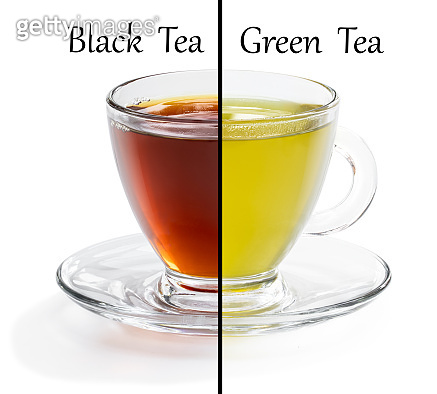 Cup split in half. Tough choice green tea vs black tea concept ...
