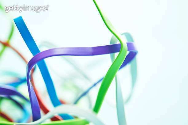 Colorful electrical cables tangled together 이미지 (1125225245) - 게티이미지뱅크