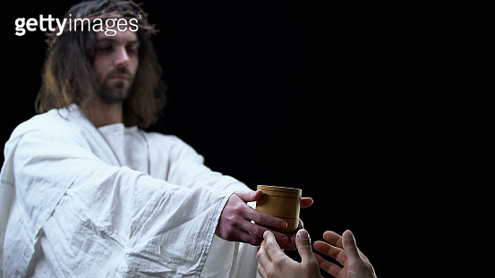 Holy savior giving cup of water poor man, religious mercy, kindness and ...