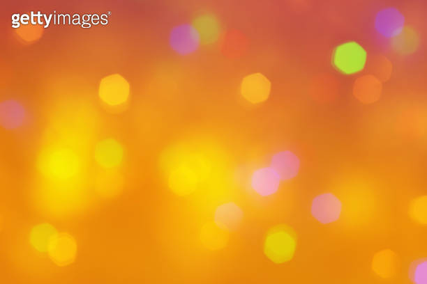 multicolored lights of a merry party blurred background in bright ...