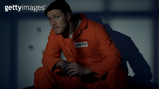 Imprisoned man with planning prison escape, dangerous weapon, breaking ...
