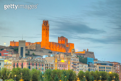 Sunset view over La Seu Vella cathedral erected over Lleida town in ...