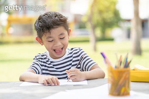 Little kid drawing sketching cute adorable. Happy cheerful child ...