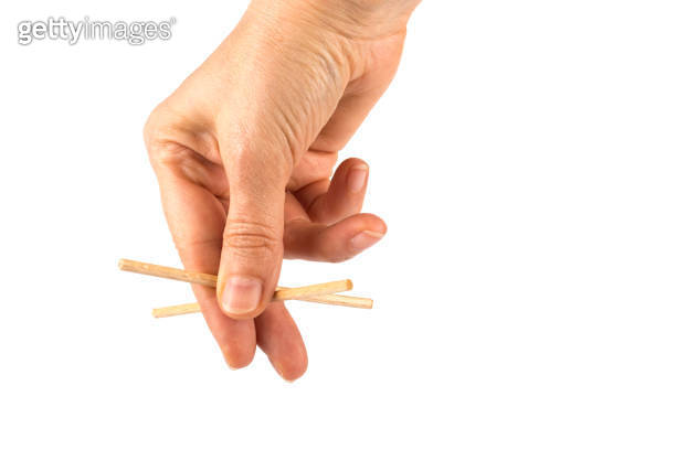 Human hand holds string puppet tools - marionette (1162153188) - 게티이미지뱅크