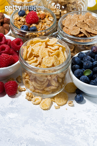 corn flakes and an assortment of healthy breakfast products 이미지 ...