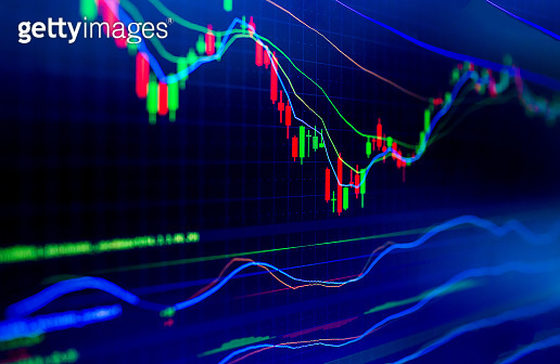 Selective focus of Business graph charts of financial instruments with ...