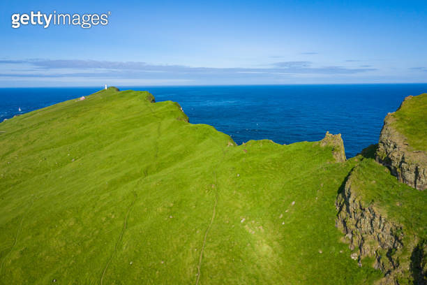 Aerial view of Mykines island in Faroe Islands, North Atlantic Ocean ...