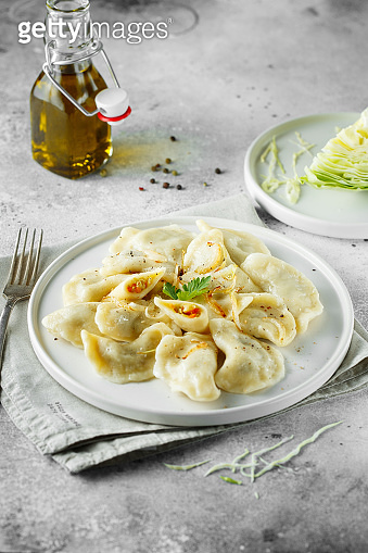 Russian, Ukrainian or Polish dish: varenyky, vareniki, pierogi, pyrohy ...