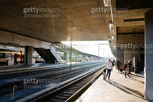 Passengers and tourists waiting for the train at Bahnhof Basel SBB ...