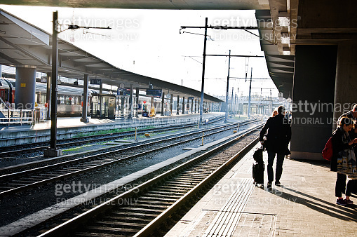 Passengers and tourists waiting for the train at Bahnhof Basel SBB ...