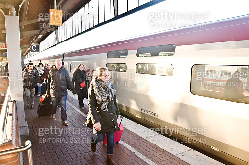 Tourists and travellers boarding a SNCF/SNCB owned Thalys high-speed ...
