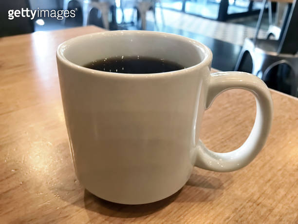 Cup of coffee in a diner table 이미지 (1181269469) - 게티이미지뱅크