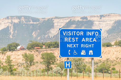 Sign closeup for Visitor center info and rest area next right exit in ...
