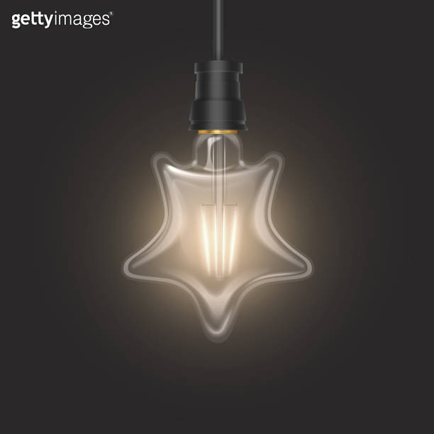 Star shaped bulb in retro style on dark substrate, glowing light bulb ...