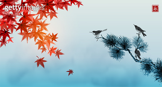 Landscape with red japanese maple leaves, blue cloudy sky and three ...