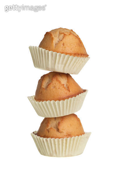 Stack of muffins on white background, a pile of three cupcakes 이미지 ...