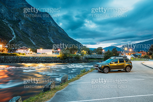 Eidfjord, Norway. Car Renault Duster SUV Parked Near Mountains River In ...