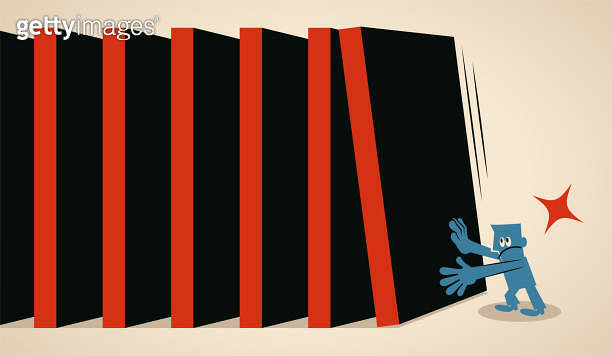 Businessman touching the first domino in the row and all the other ...