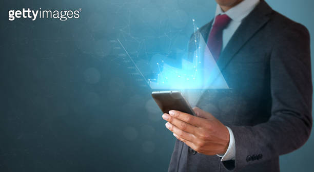Businessman analyze finance and interest rate by mobile phone ...
