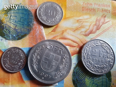 approach to swiss coins and banknotes 이미지 (1184777596) - 게티이미지뱅크
