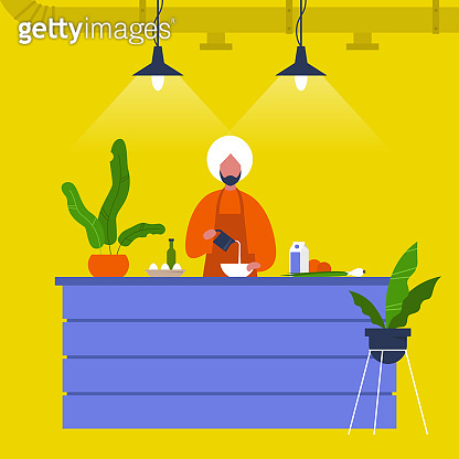 Kitchen. Young indian male chief cooking food at the counter. Cafe ...