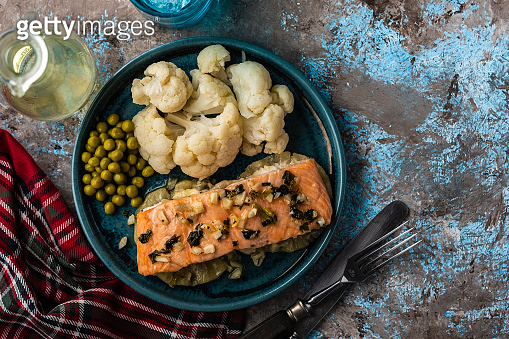 Solomon fillet with pineapple and cauliflower. Fish with vegetables ...